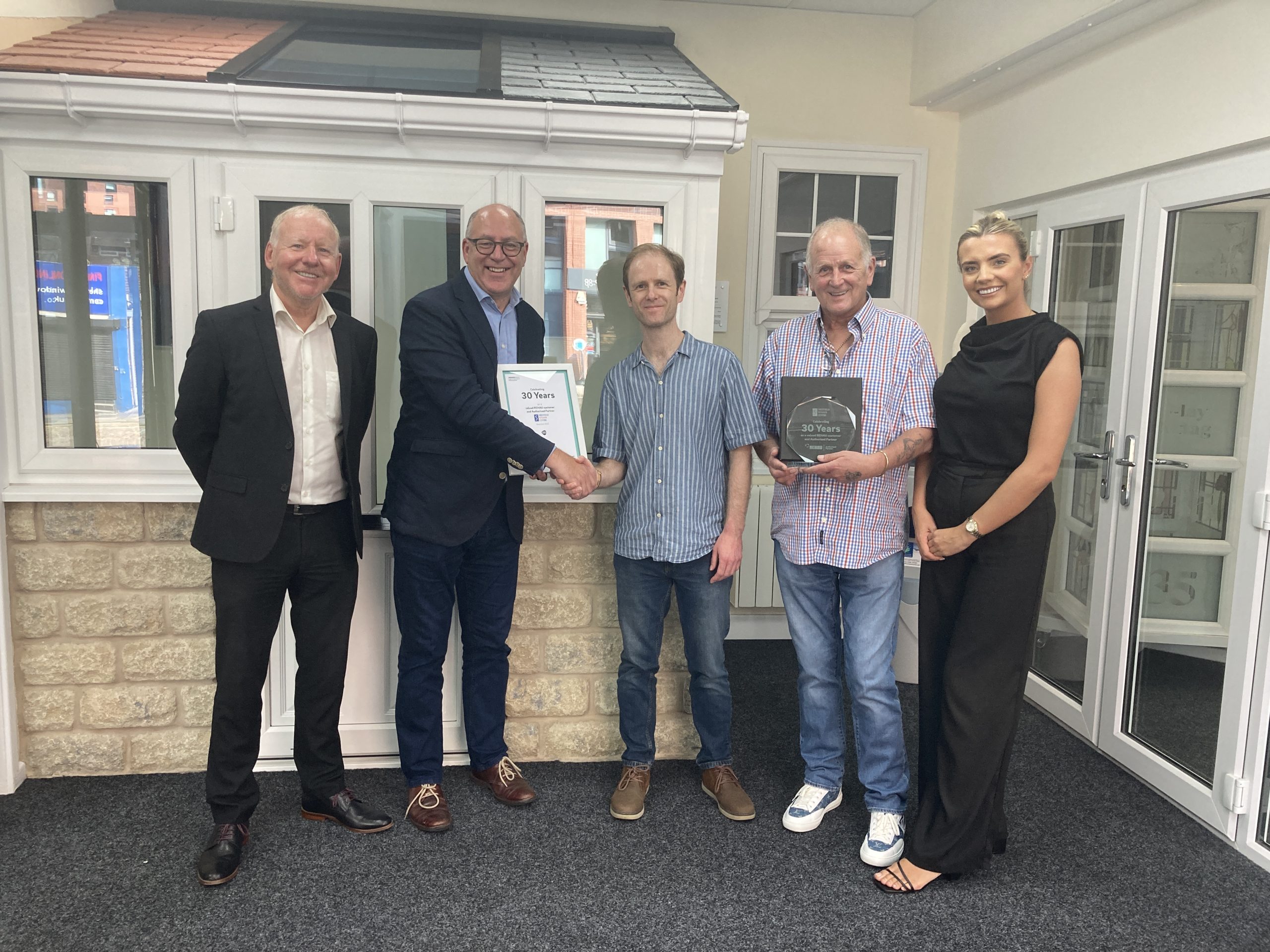 Rehau marks 30-year partnership - Glass Times